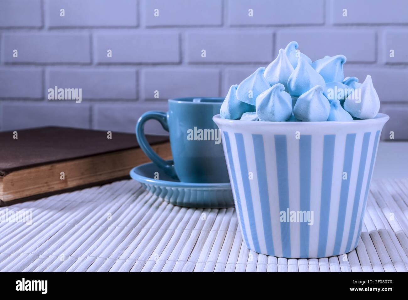 Blue Sweets And Cup Stock Photo - Alamy
