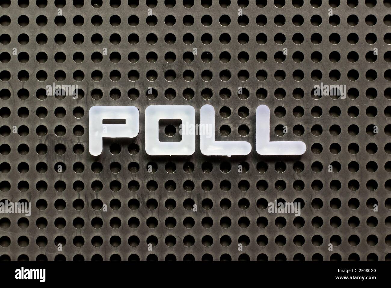 White color letter in word poll, on black pegboard background Stock ...