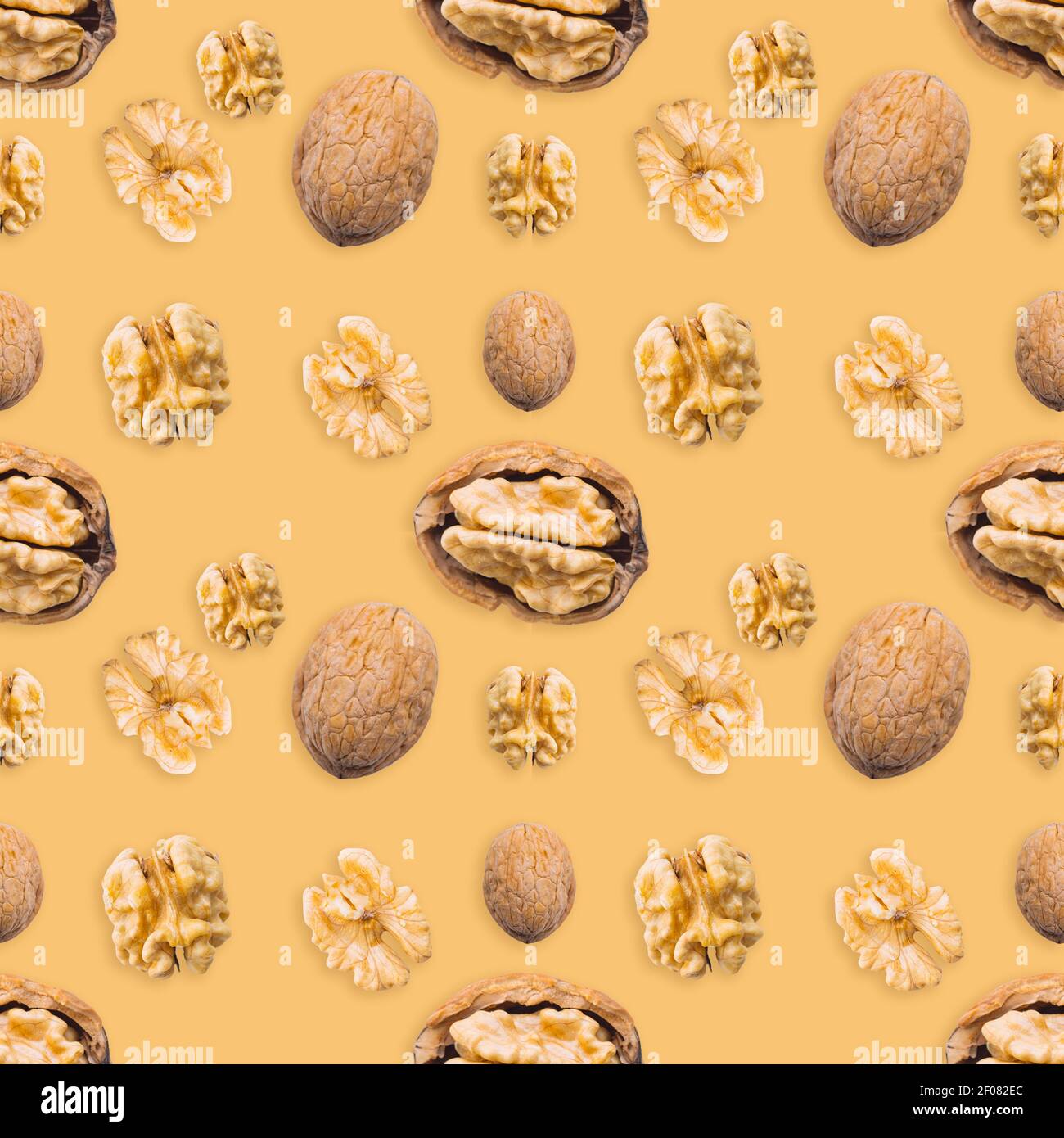 Walnut seamless pattern on brown background. Open nut shell and kernel ...