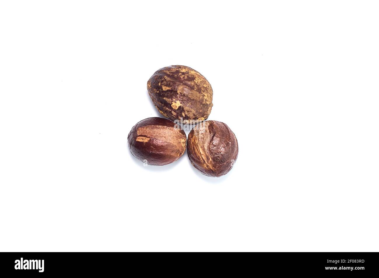 Nutmeg isolated on white background Stock Photo - Alamy