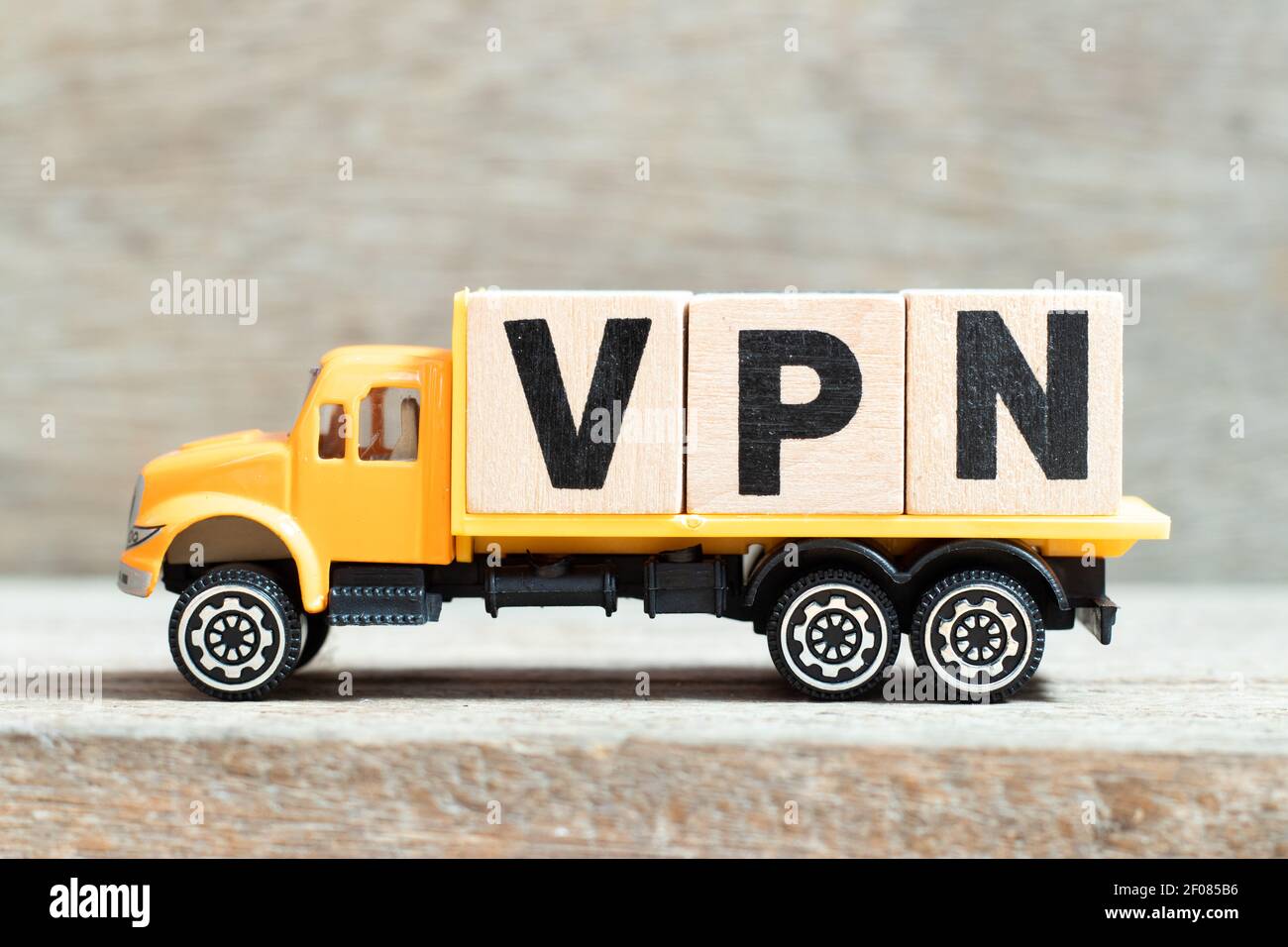 Toy truck hold alphabet letter block in word VPN (abbreviation of ...