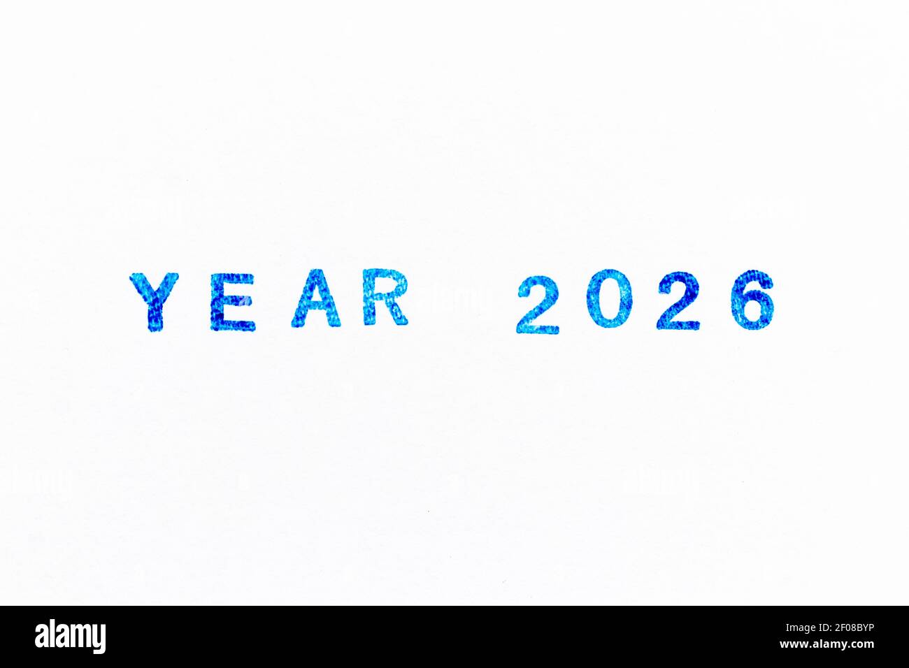 Blue color ink of rubber stamp in word year 2026 on white paper ...