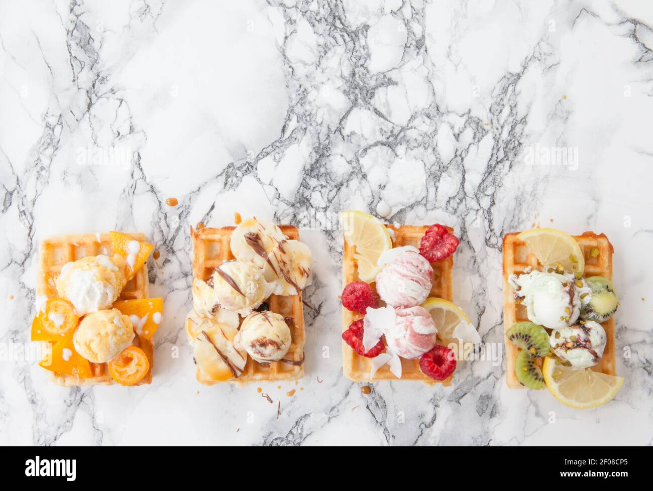Waffles with coloured fruits Stock Photo - Alamy