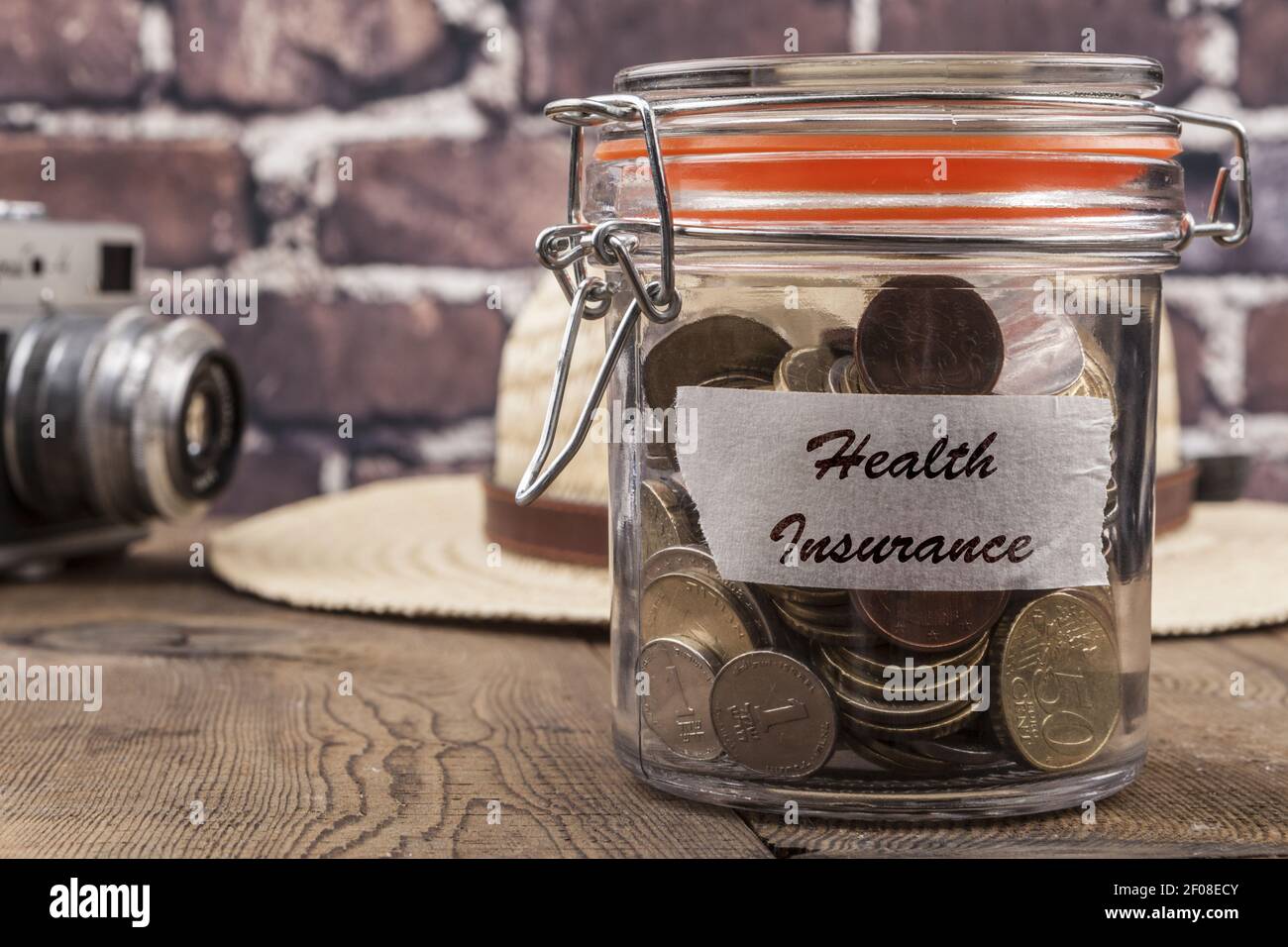 Health Insurance Savings Jar Stock Photo - Alamy