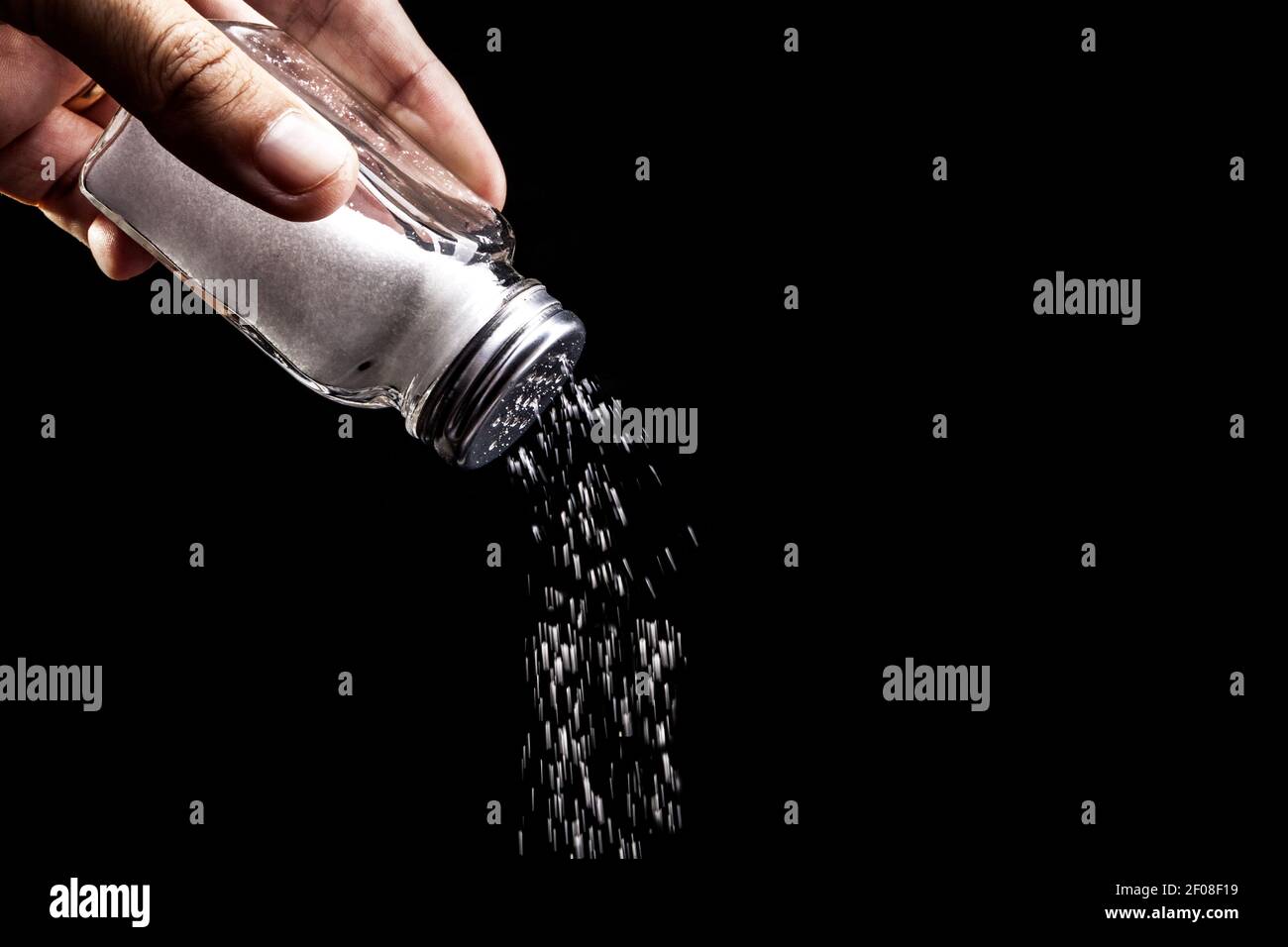 Hand and Salt Stock Photo - Alamy
