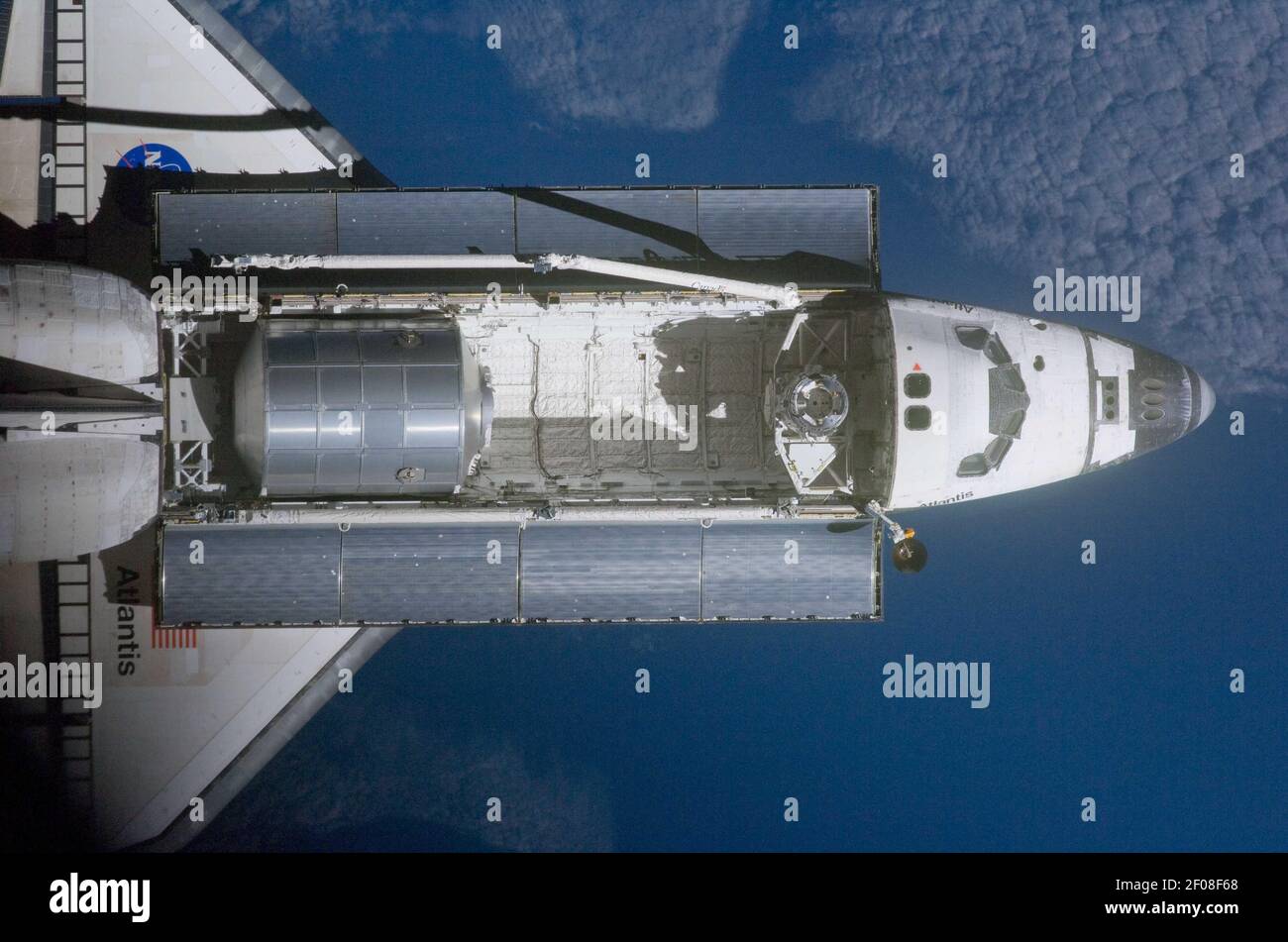 10 July 2011 - A nadir view of the space shuttle Atlantis and its ...