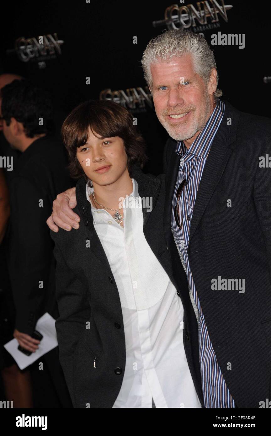 Leo Howard and Ron Perlman. 11 August 2011, Los Angeles, CA. Conan The ...