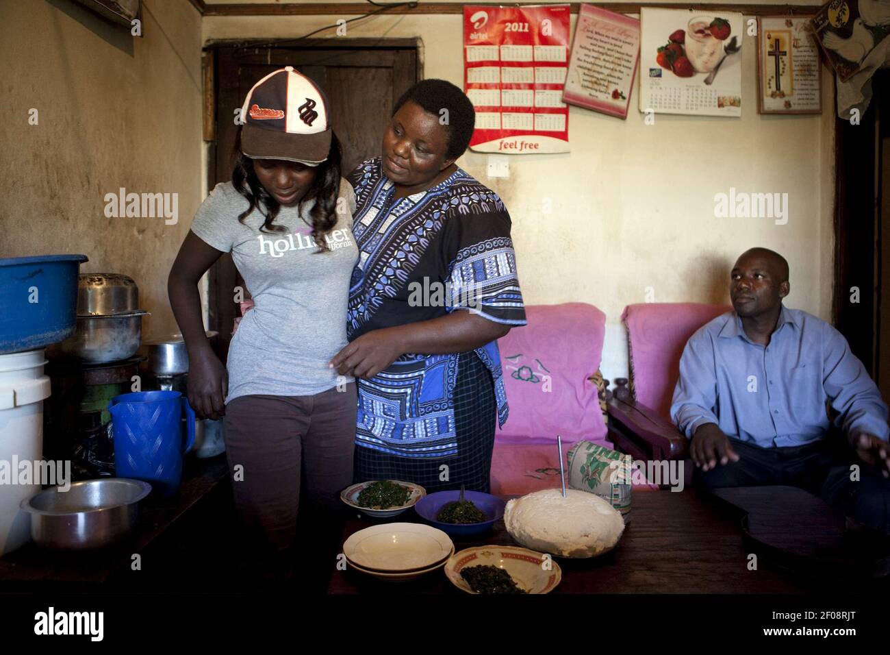13 August 2011 - Ukunda, Kenya - Christine Wanza Mutungi with her ...