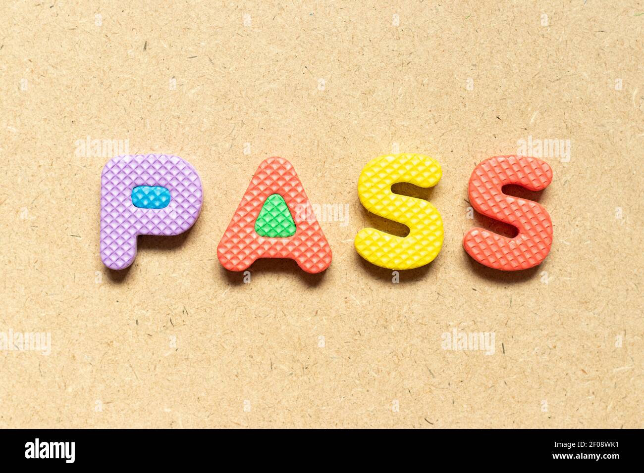 Foam alphabet letter in word pass on wood background Stock Photo - Alamy