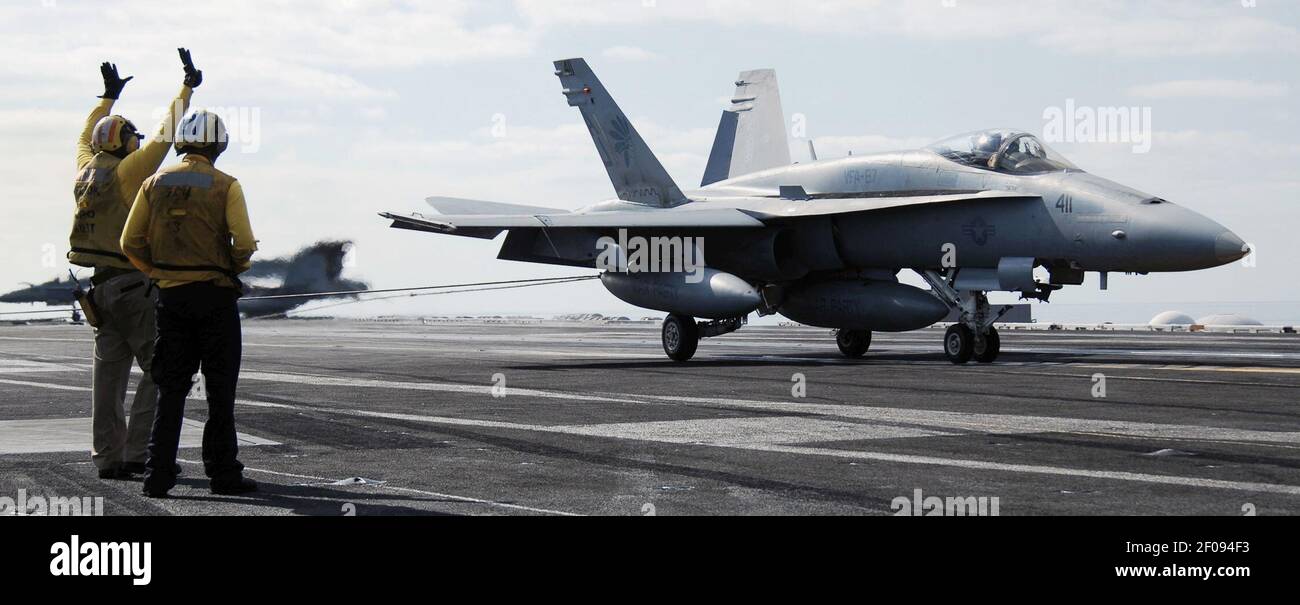 Plane handler on flight deck of USS Theodore Roosevelt (CVN-71 ...