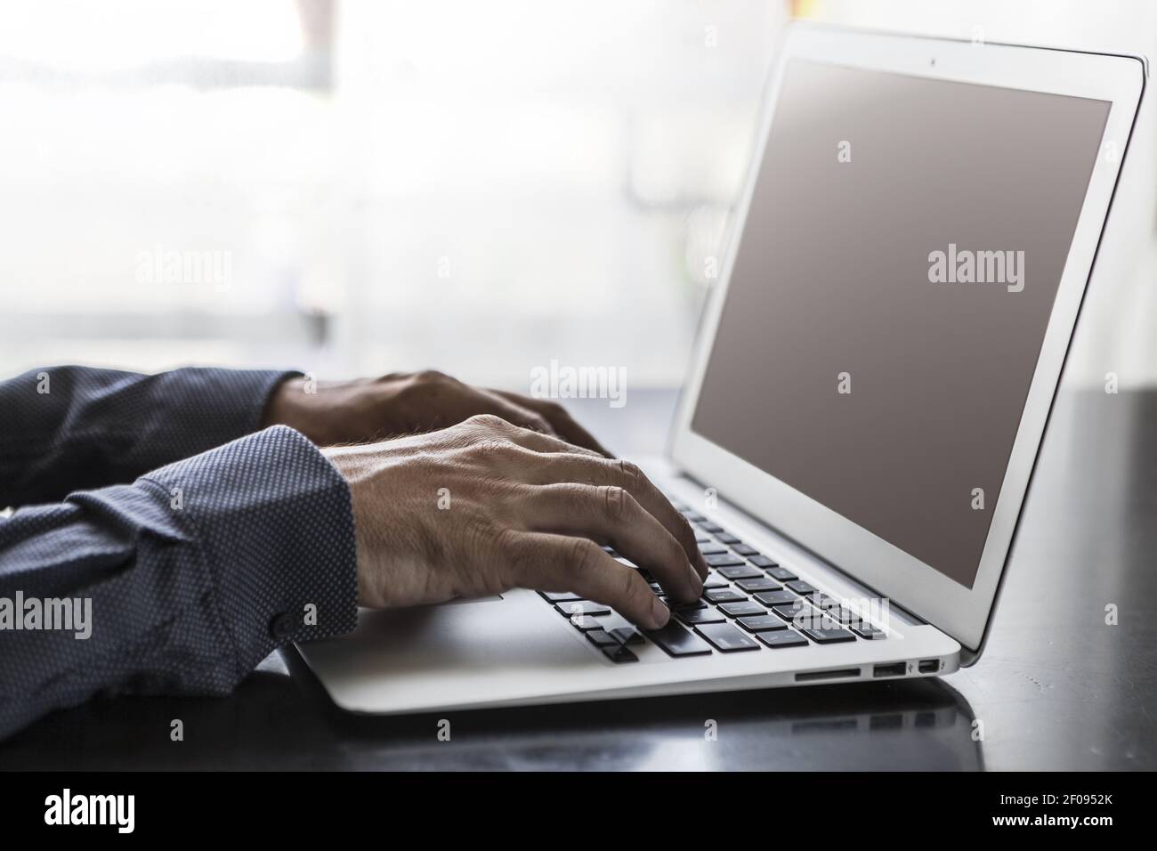 Hands On Laptop Stock Photo - Alamy