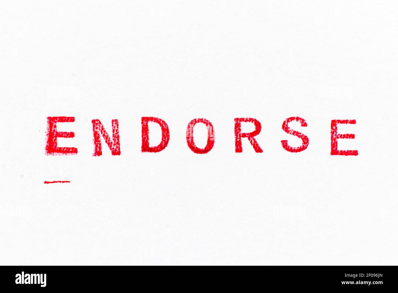 Red color endorse word ink rubber stamp on white paper background Stock ...
