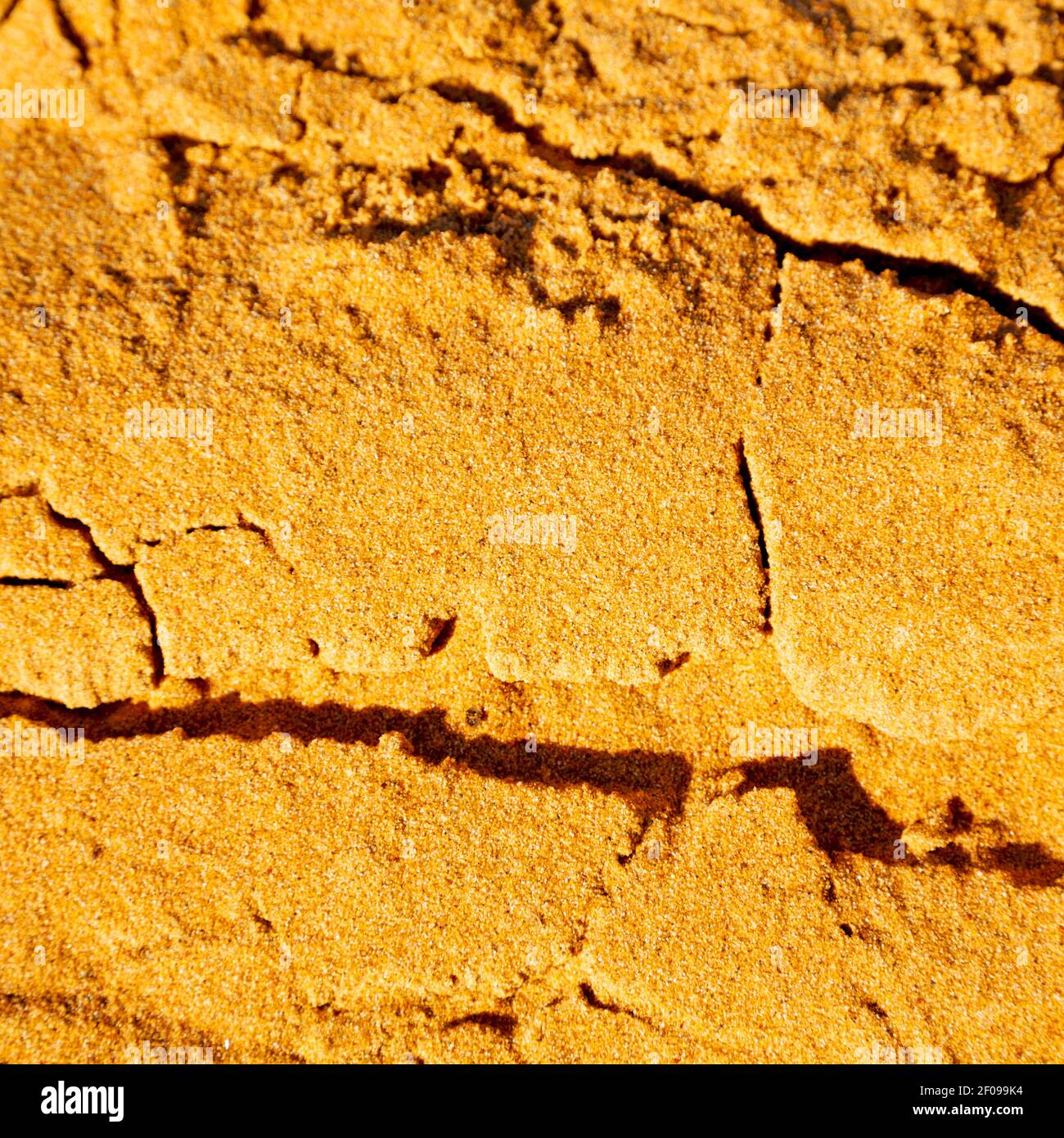 In oman rub al khali old desert and the abstract cracked sand texture ...