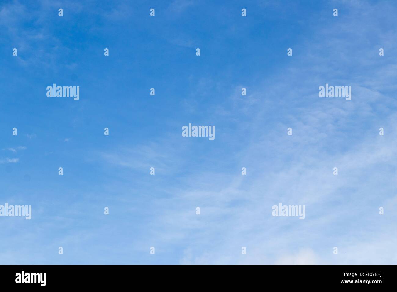 Clear blue color sky with white cloud background Stock Photo - Alamy