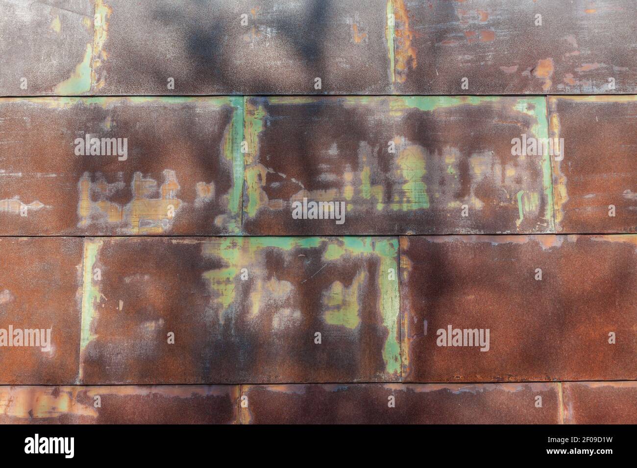 Rusty steel plating made by Nisshin (Nippon) Steel on the wall of a ...