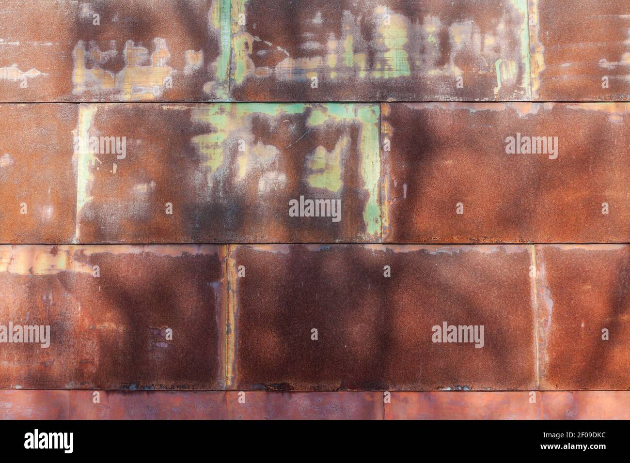 Rusty steel plating made by Nisshin (Nippon) Steel on the wall of a ...