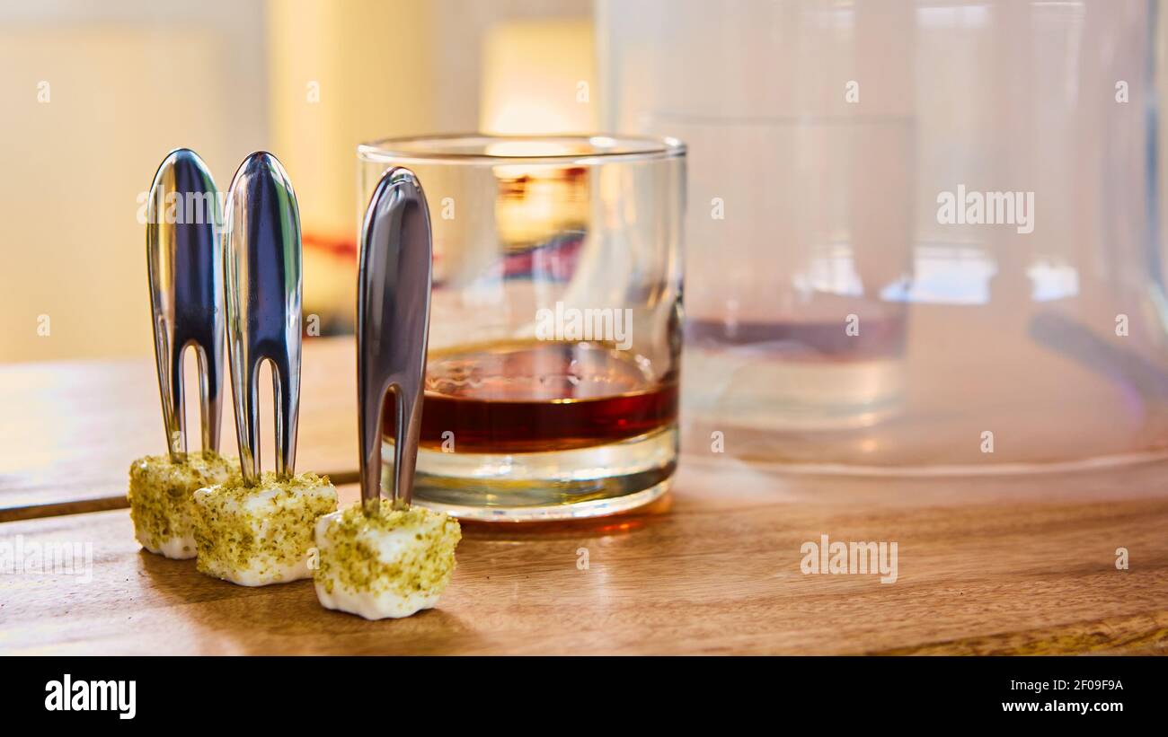 Liquid pouring cocktail glass in hi-res stock photography and images ...