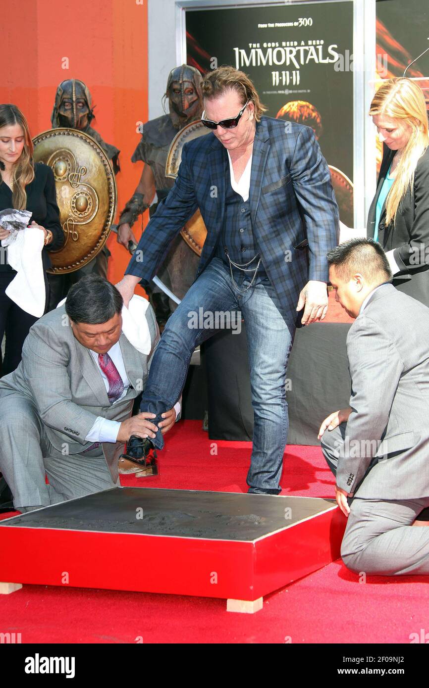 31 October 2011 - Hollywood, CA - Mickey Rourke poses during his Hand ...
