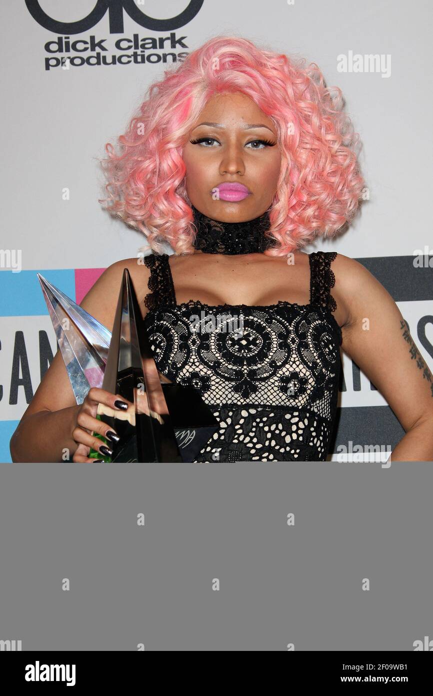 20 November 2011 - Los Angeles, CA - Nicki Minaj poses backstage to the ...