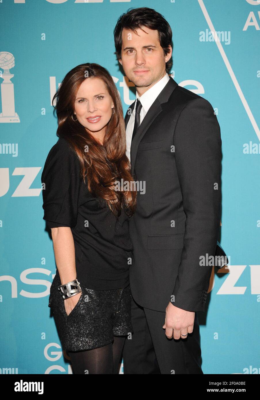 Kristoffer Polaha and his wife Julianne Morris. 8 December 2011, Los ...