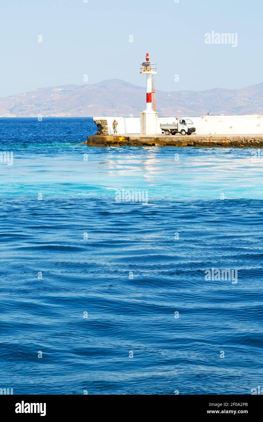 Lighthouse greece island and pier Stock Photo - Alamy