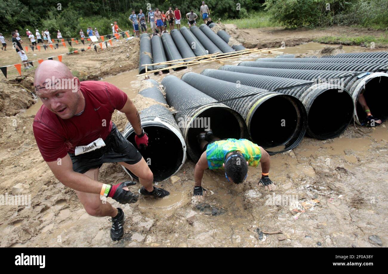 Participants exit the Boa Constrictor where the slide down a pipe into ...