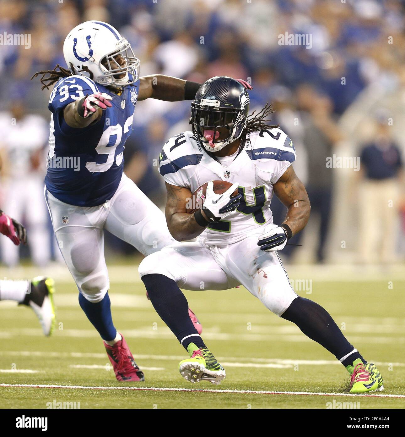 Seattle Seahawks running back Marshawn Lynch (24) tries to avoid ...