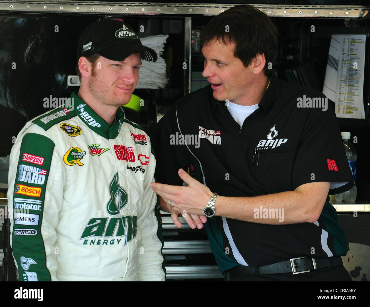 NASCAR Sprint Cup Series driver Dale Earnhardt Jr., left, and crew ...