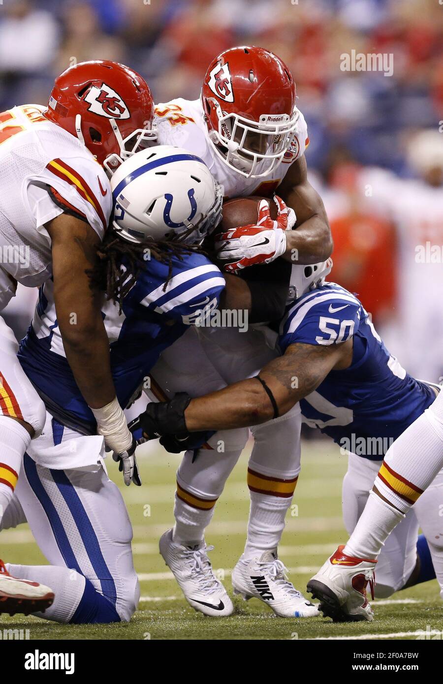 Kansas City Chiefs running back Knile Davis (34) attempts to get past ...