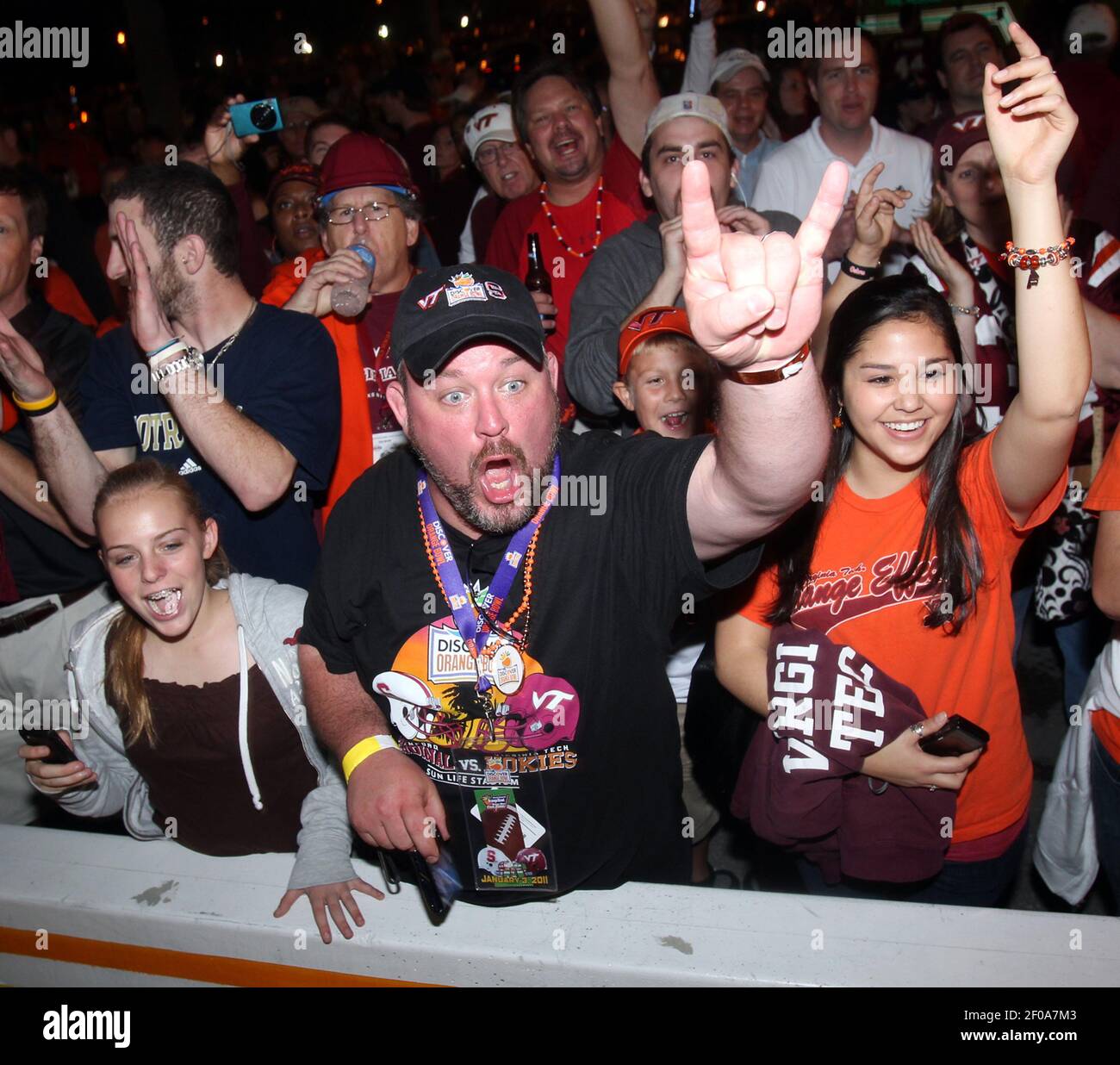 Virginia Tech fans cheer as the Hokies arrive for the Discover Orange ...