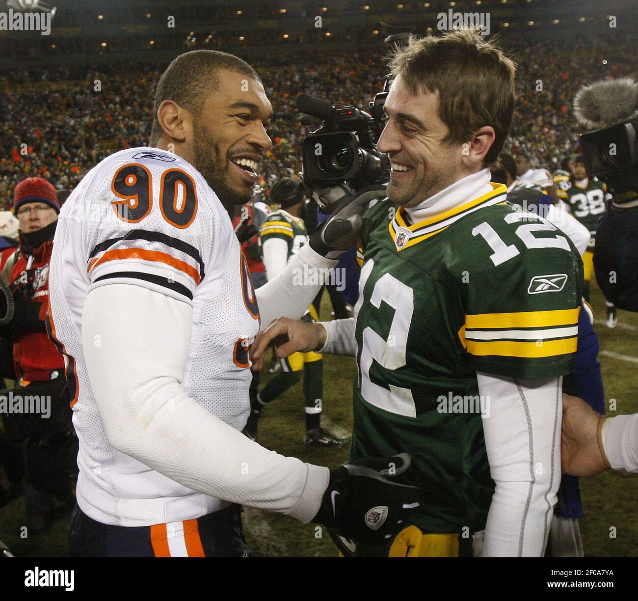 Green Bay Packers' Aaron Rodgers exchange smiles with Chicago Bears ...