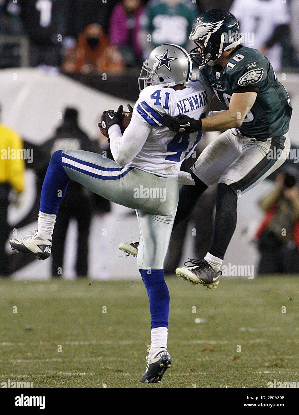 Dallas Cowboys' Terence Newman intercepts a pass intended for ...
