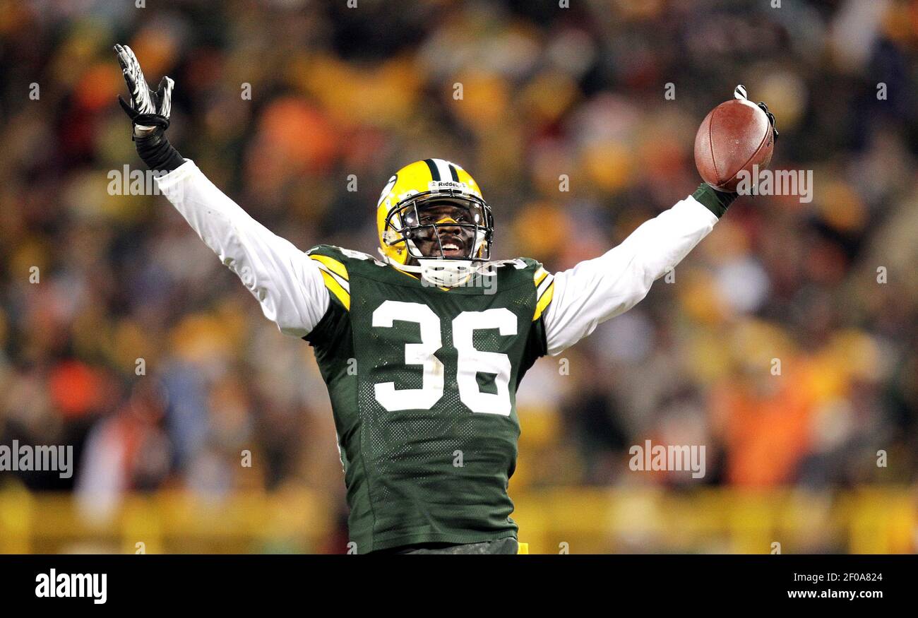 Green Bay Packers Nick Collins celebrates after making an interception ...