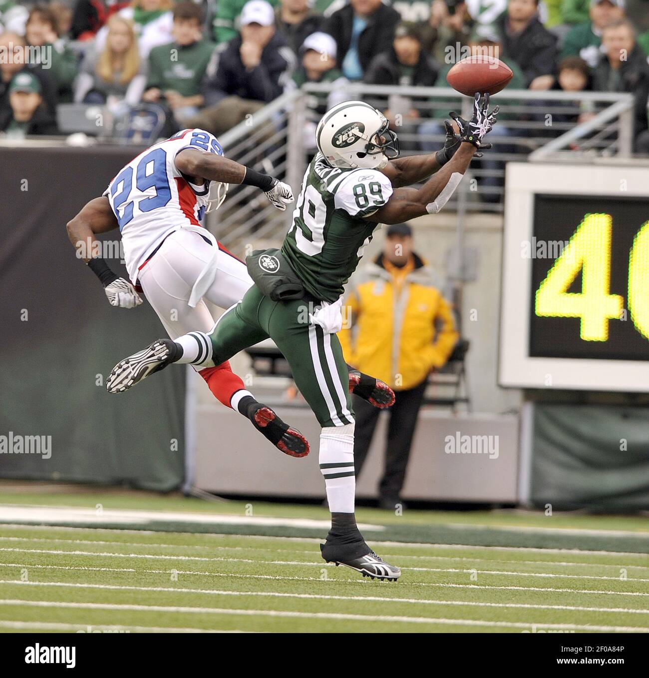 New York Jets' Jerricho Cotchery makes an acrobatic catch against ...