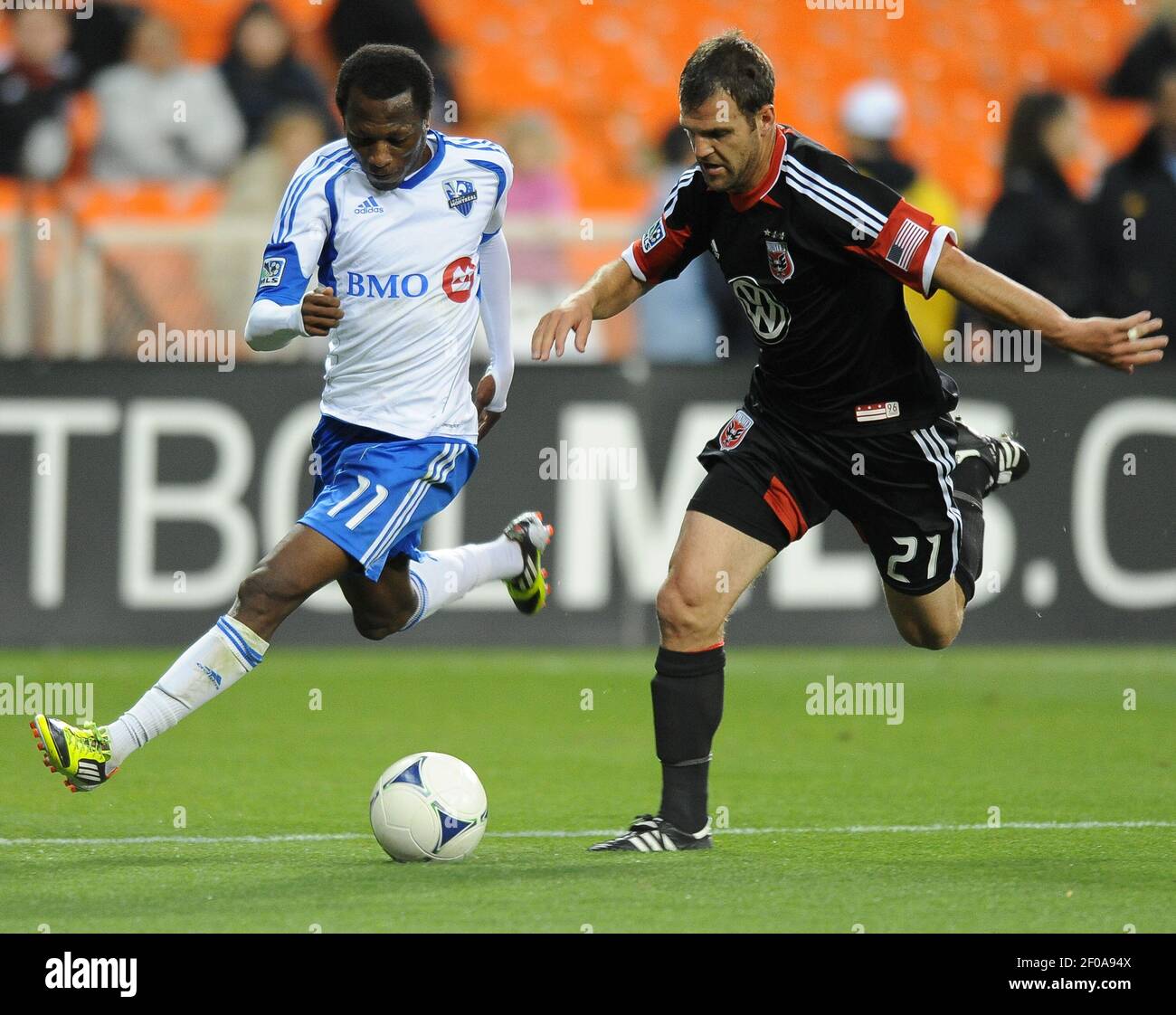 Montreal Impact midfielder Sanna Nyassi (11) tries to break around D.C ...