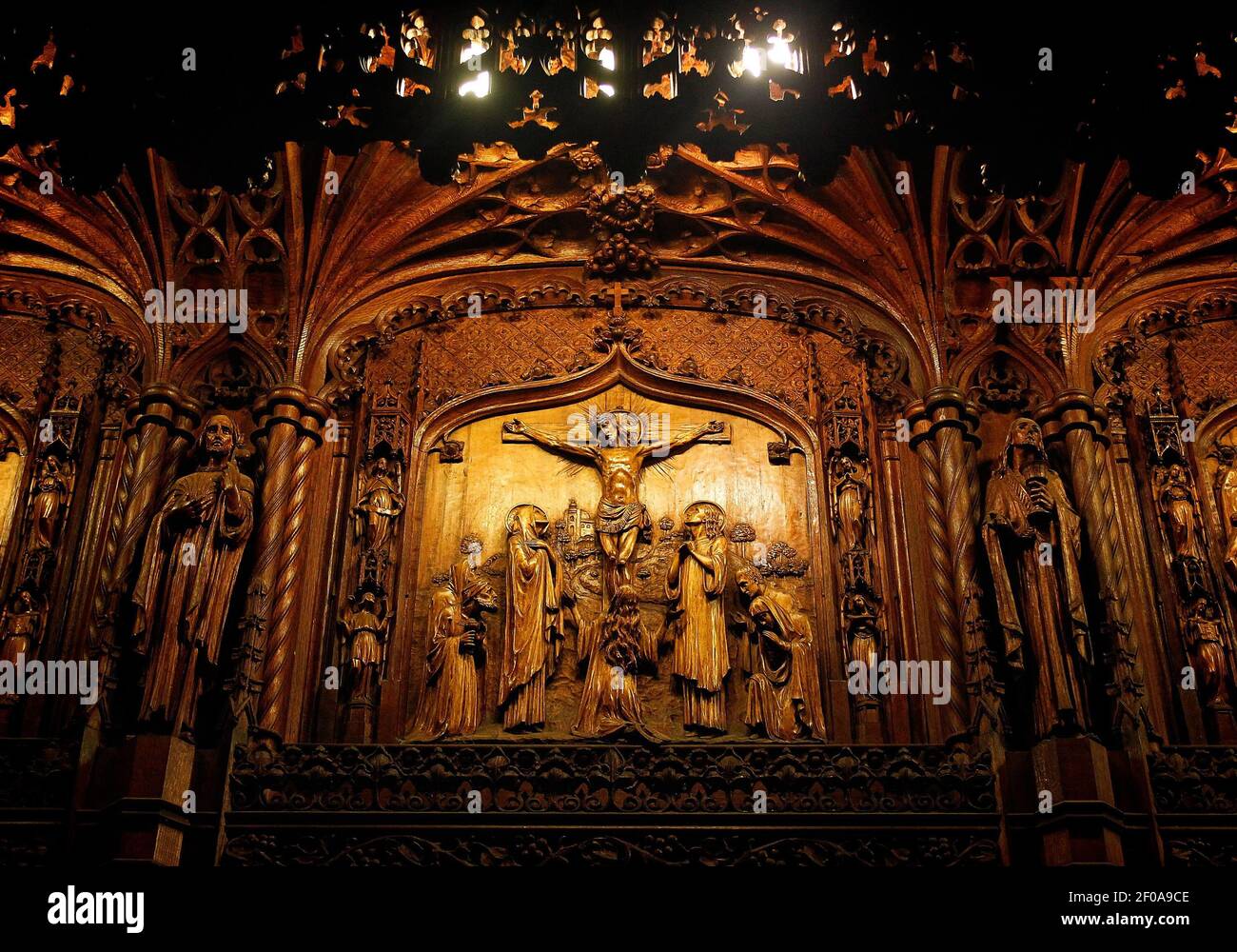 A detail of the hand carved, wooden Stations of the Cross is displayed ...