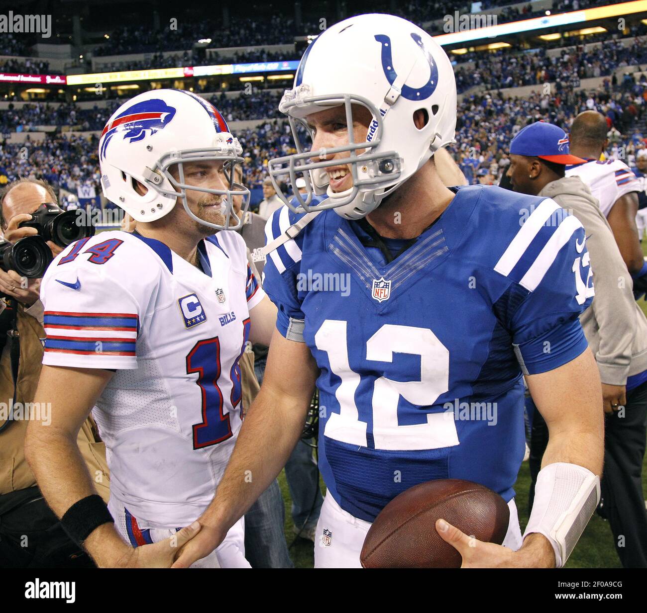 Indianapolis Colts quarterback Andrew Luck (12) shakes hands with ...
