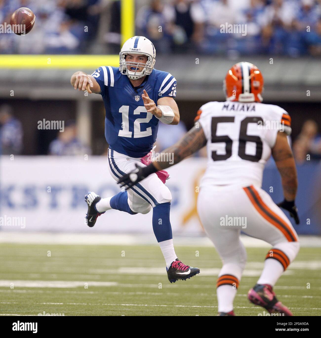 Indianapolis Colts quarterback Andrew Luck (12) throws under pressure ...