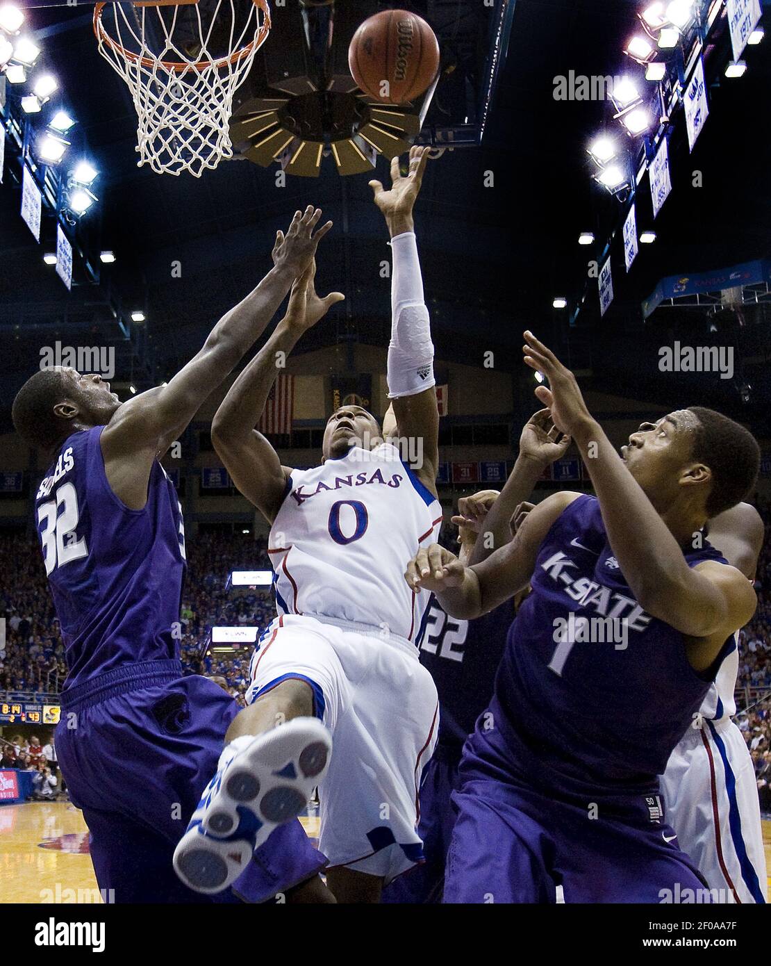 Kansas' Thomas Rotate's Jamar Samuels, left, and Shane Southwell during ...