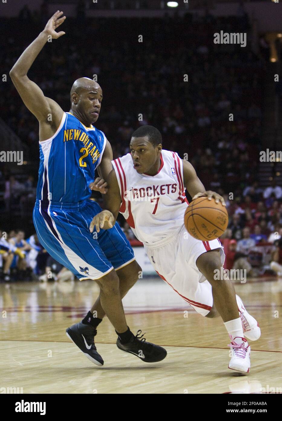 Kyle Lowry (7) of the Houston Rockets tries to drive by Jarrett Jack (2 ...