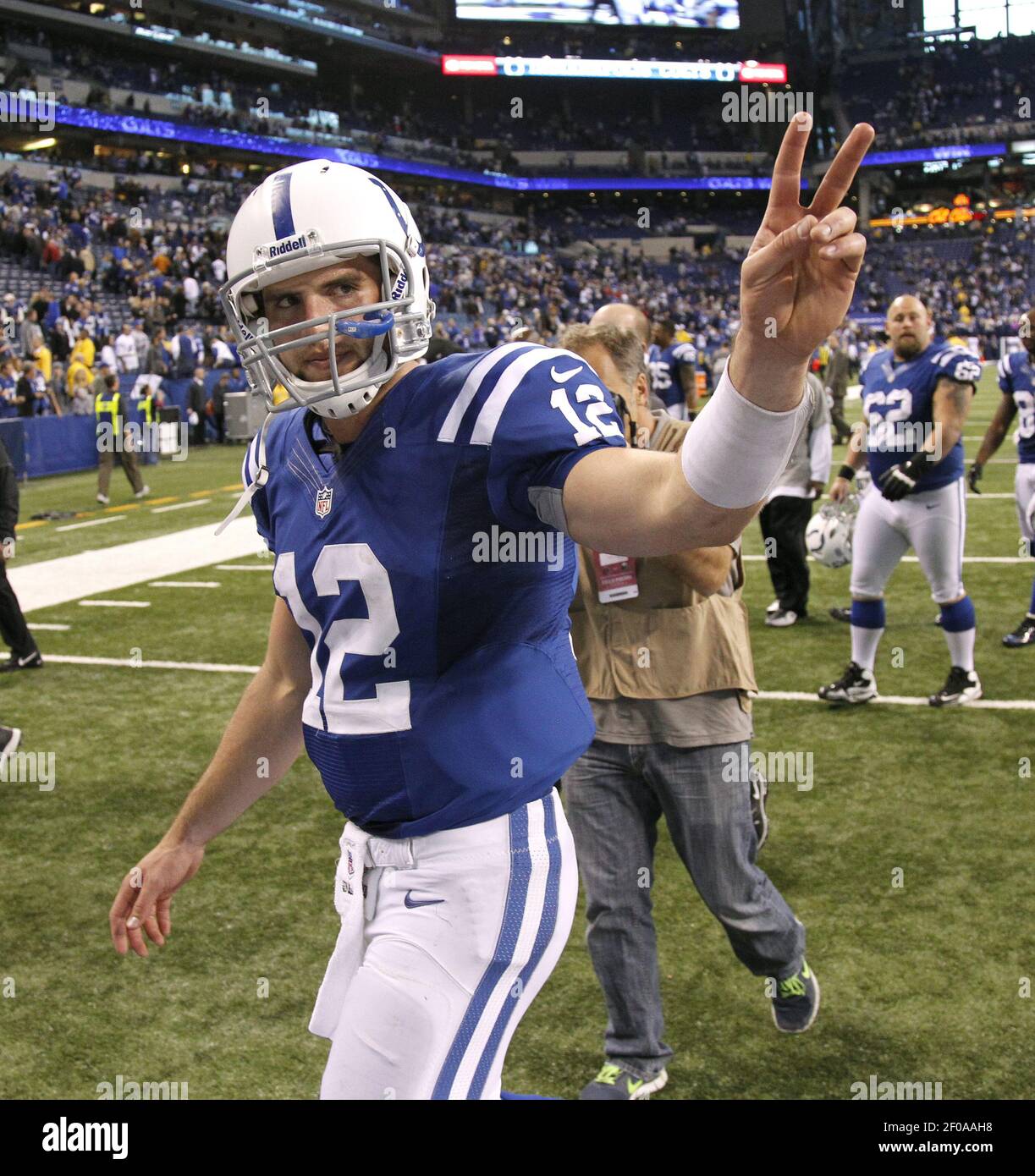 Indianapolis Colts quarterback Andrew Luck (12) waves to the crowd ...