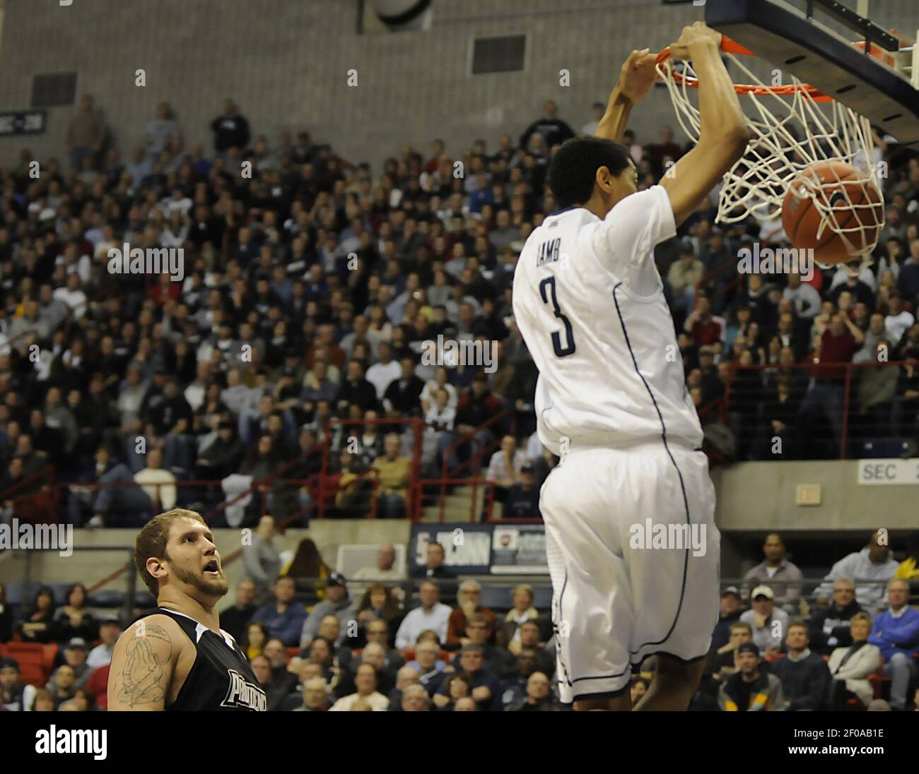 Jeremy Lamb of Connecticut dunks in front of Ray Hall of Providence ...