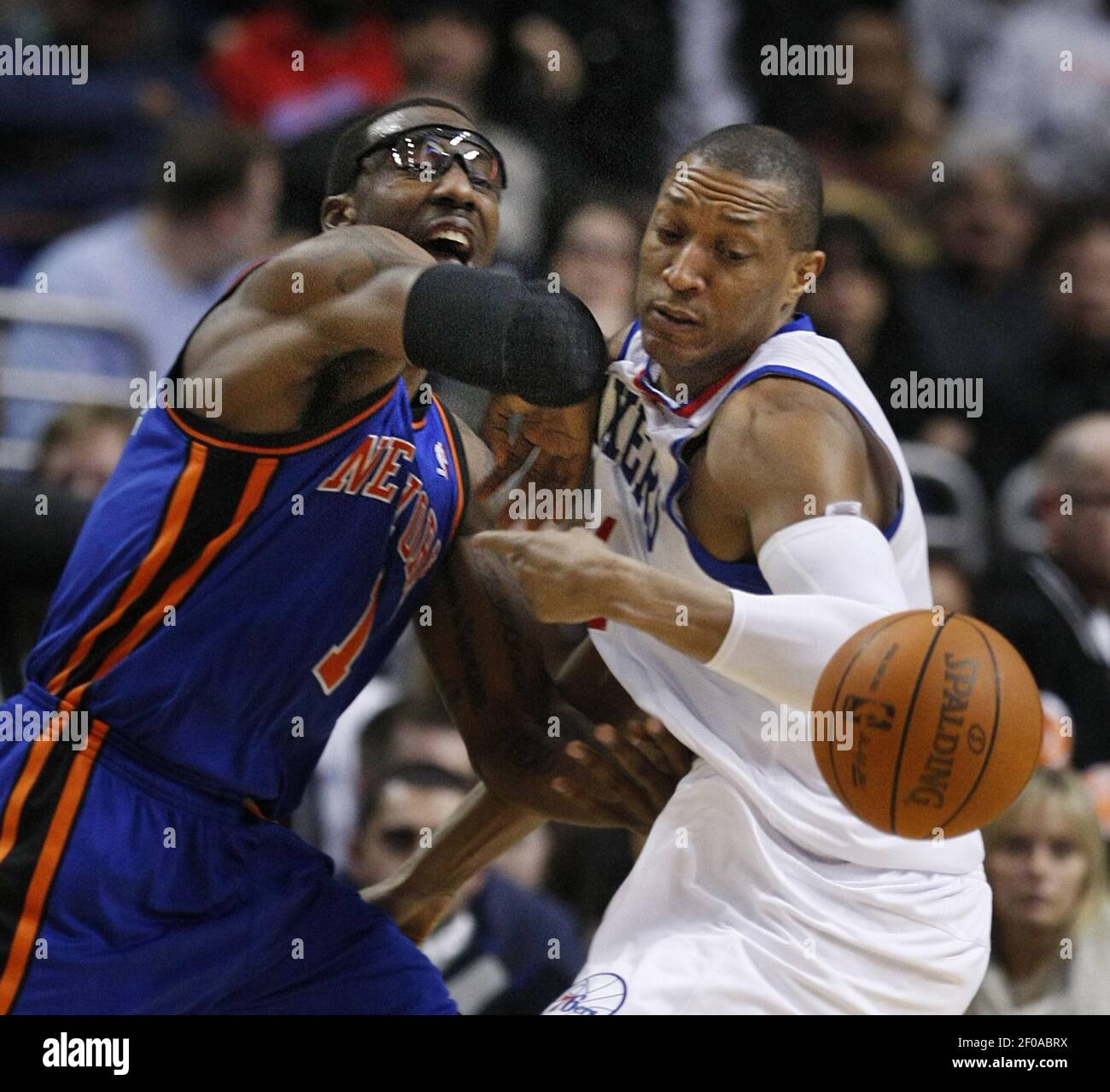 The New York Knicks' Amar'e Stoudemire, left, battles Tony Battie of ...