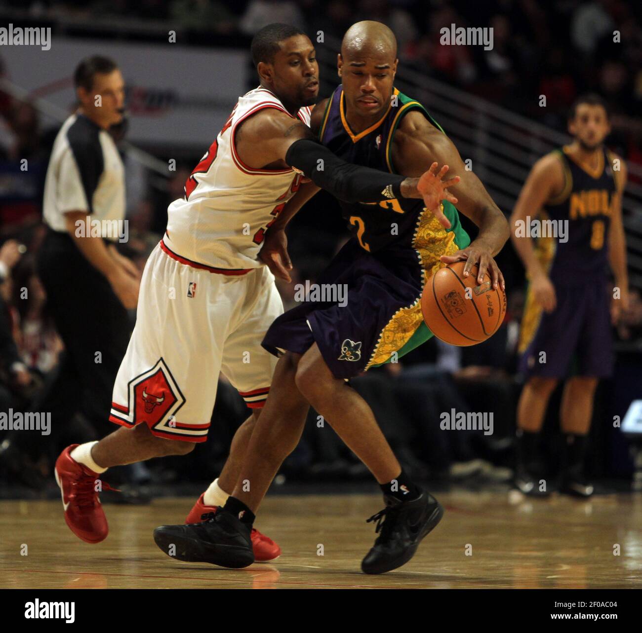 Chicago Bulls' C.J. Watson defends New Orleans Hornets' Jarrett Jack in ...
