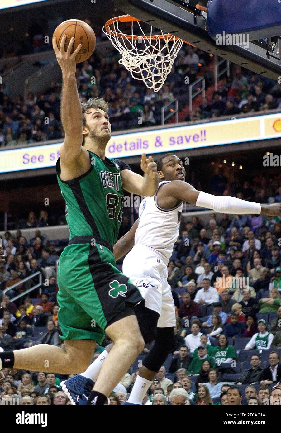 Boston Celtics center Semih Erden (86) scores after getting pass ...