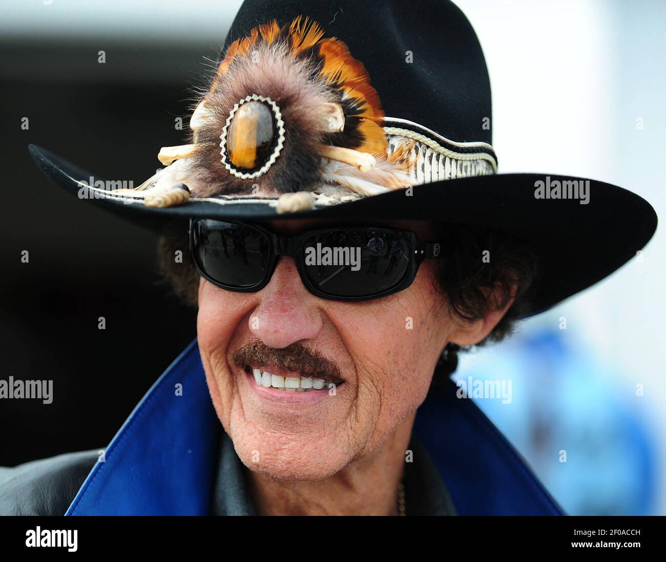 NASCAR Hall of Fame driver Richard Petty smiles at the fans as he walks ...