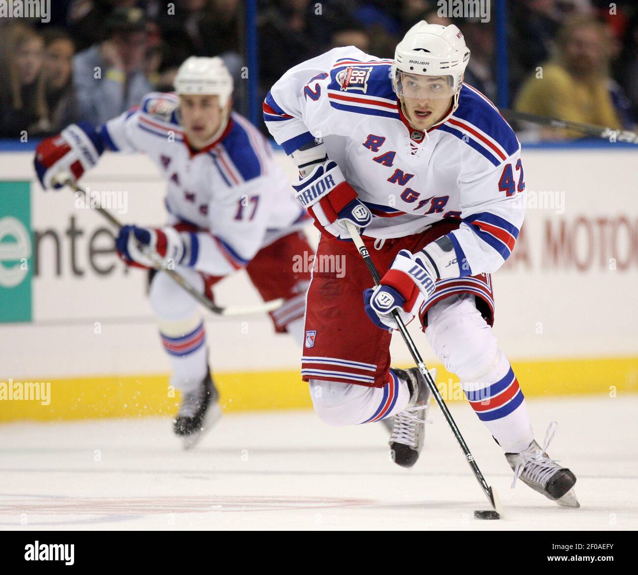 New York Rangers' Artem Anisimov brings the puck up the ice in third ...