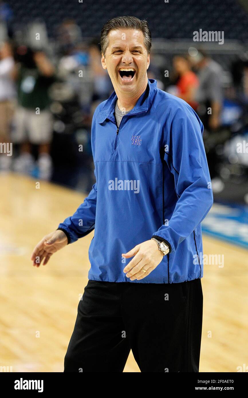 Kentucky head coach John Calipari laughs as his team practices for ...