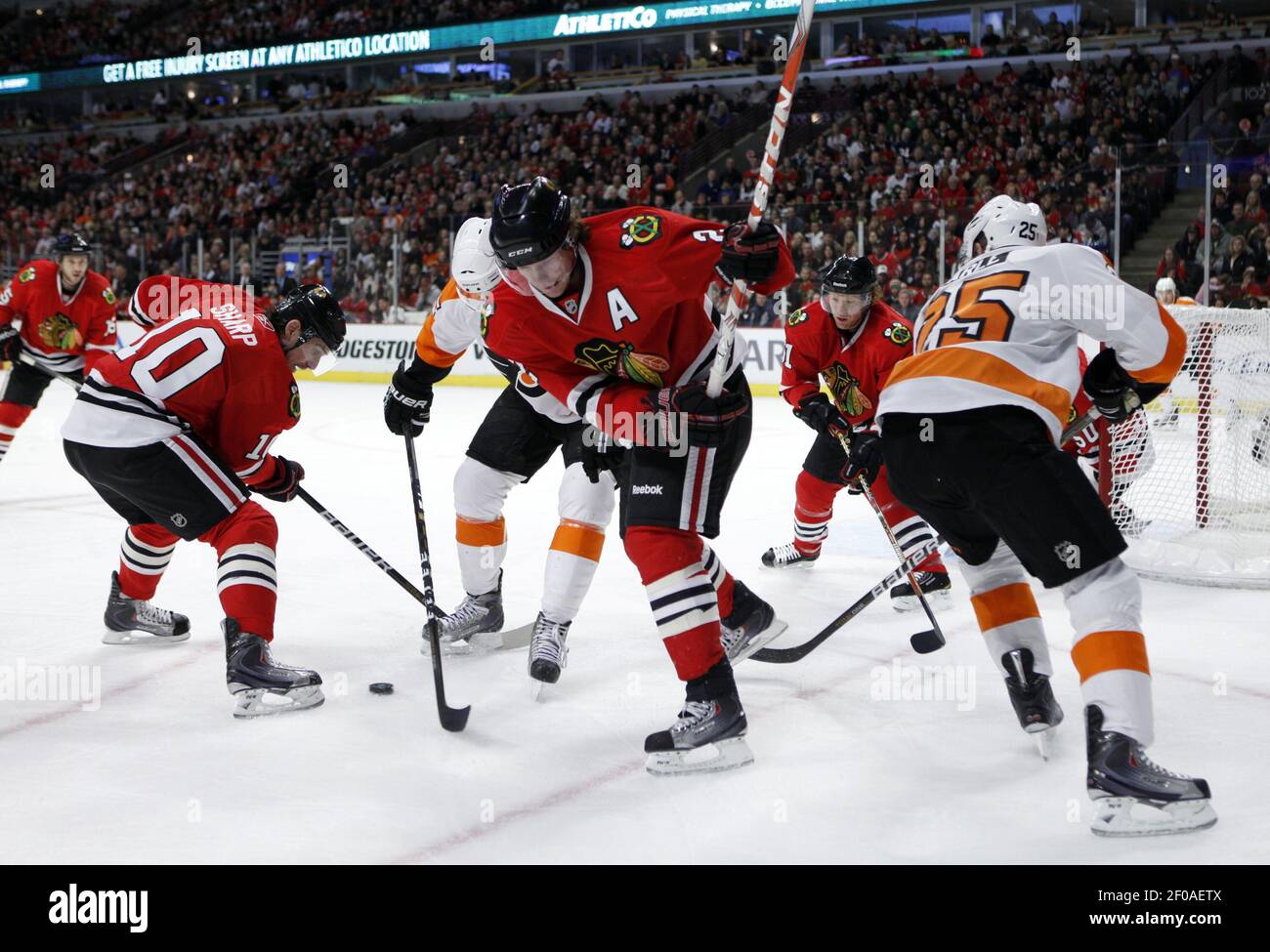 Philadelphia Flyers' Andreas Nodl and Matt Carle, from left, hack into ...