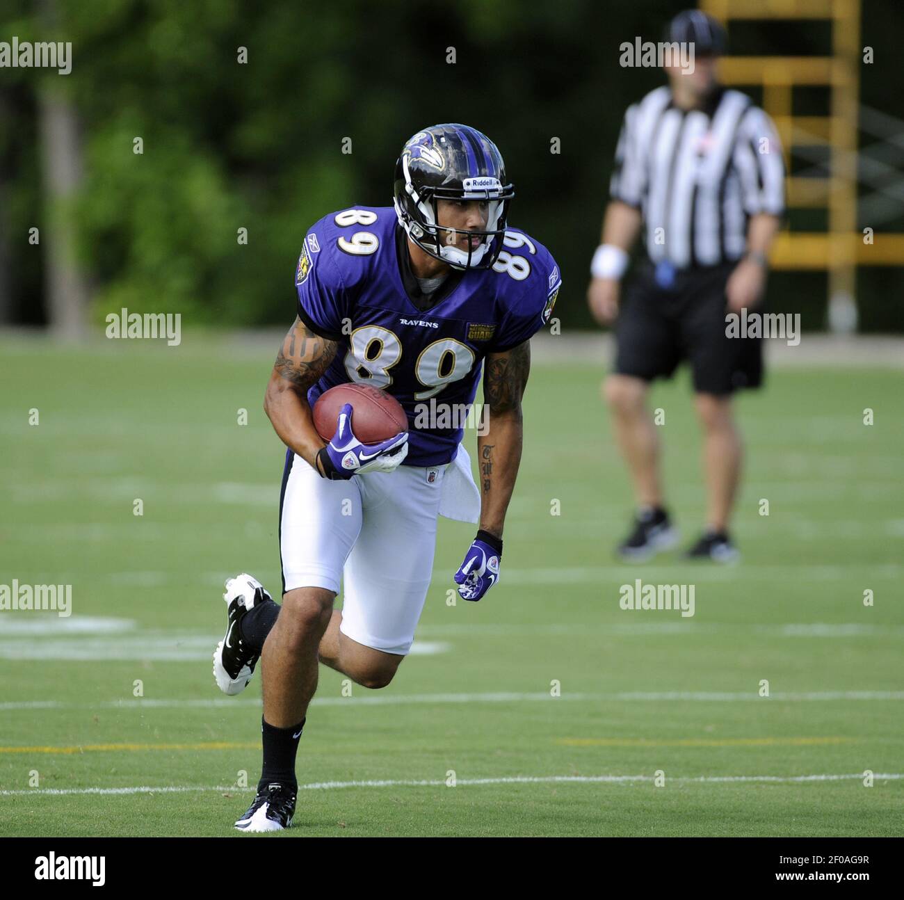 Wide receiver Tandon Doss runs a drill during the Baltimore Ravens ...
